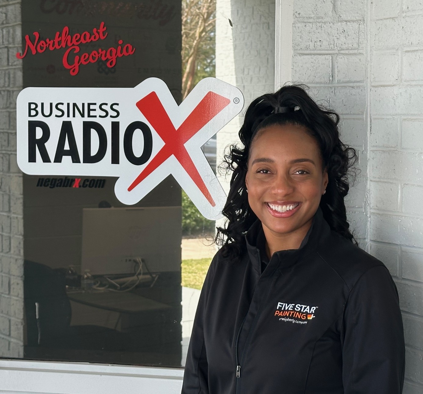 Holly Fuller With Five Star Painting of Athens - Business RadioX